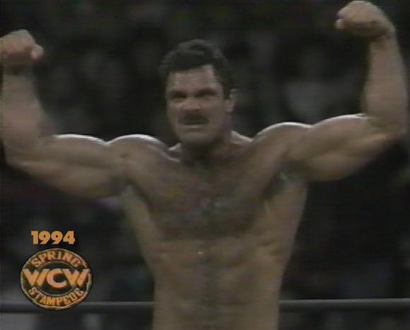 (CLICK THE PIC TO SEE RUDE GO OFF THE TOP ROPE)