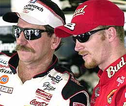 Dale and Dale Jr sit a talk stragety before the race.