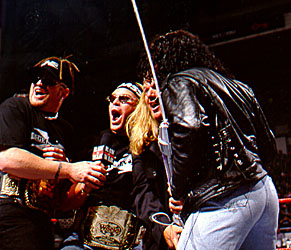 D-X sprays the crowd with a super soaker