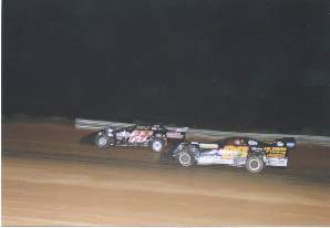 # 27 Tommy Surrett passes # c28 Kenny Merchant in turn 4