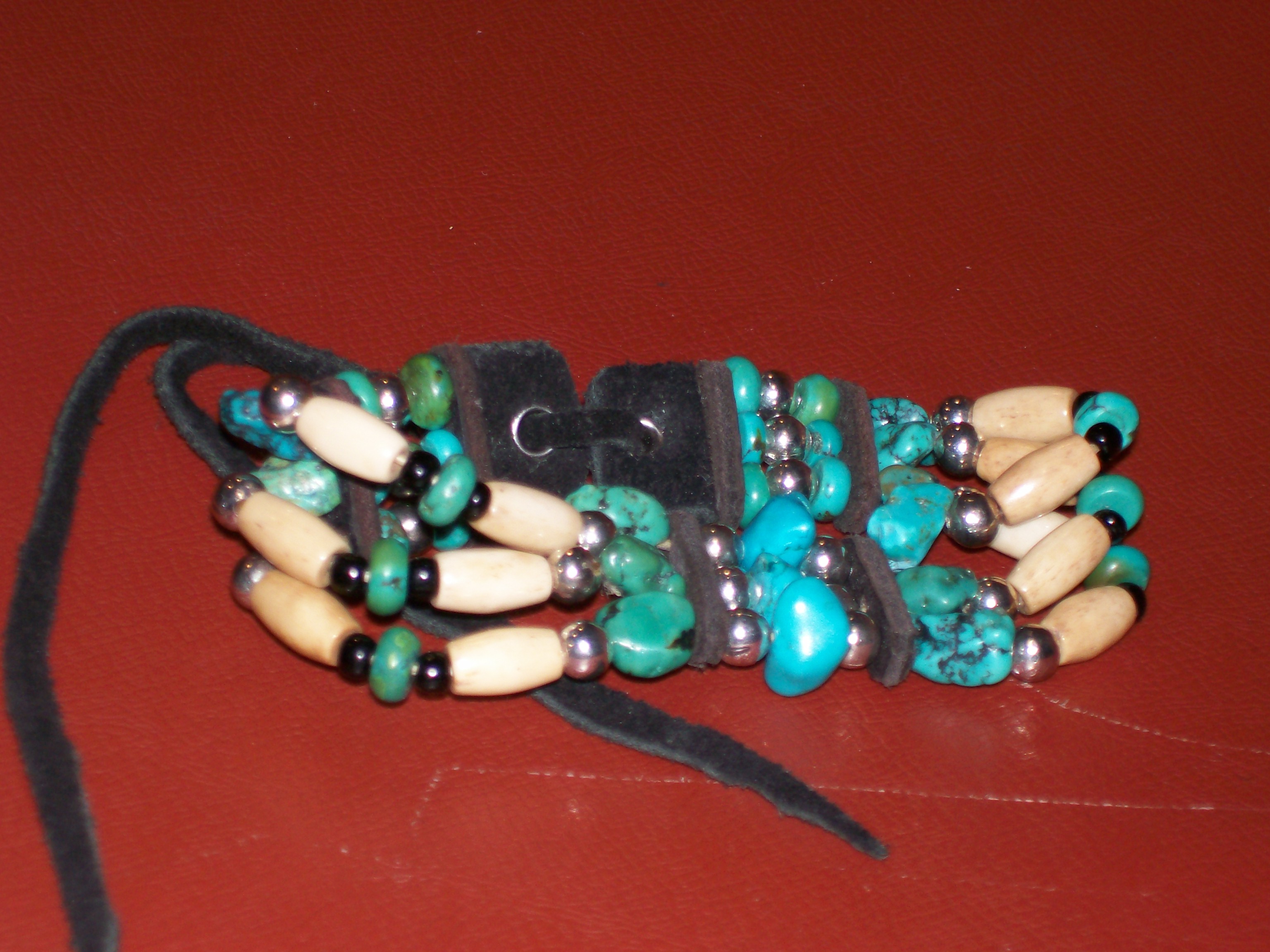 3 strand bracelet with leather tie