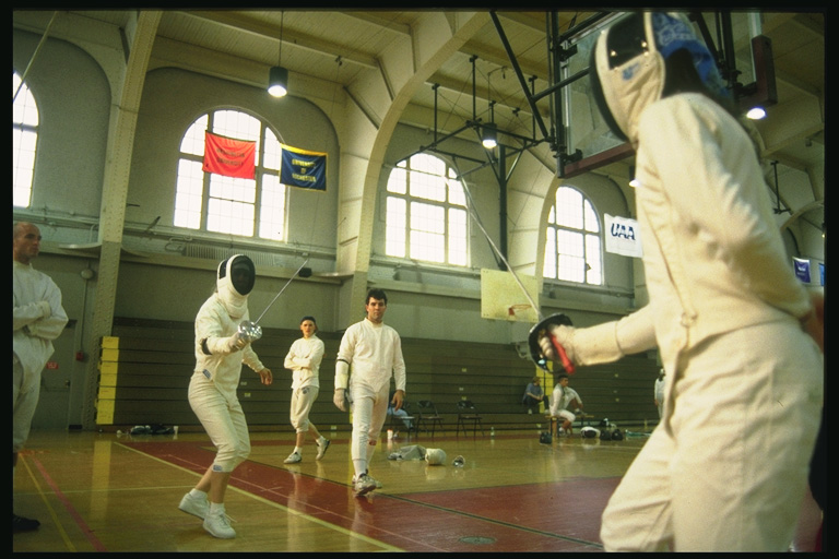 Saber is a thrusting/slashing sport. The target is anything above the ...