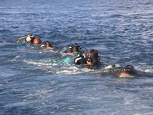 Being towed to the dive site.