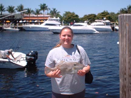 Here is Heidi holding her filefish, she was so proud of it and for good ...