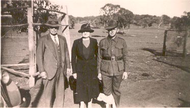 Edward Cook with his wife and son