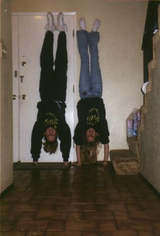Ruth and Tammy doing handstands.
