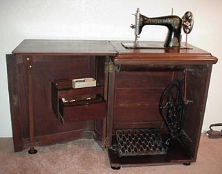 This is a close up of the Model 15 Sewing Machine head. The design is ...