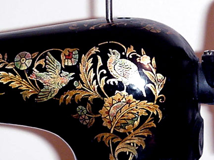 This is a closeup of the pheasant decals on the arm of the machine ...