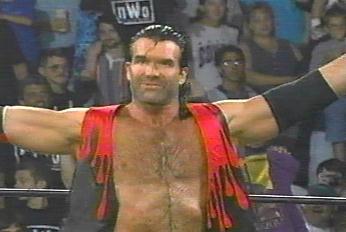 (Nash walks over the top rope. Hall stomps his feet against the ground ...