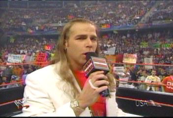HBK walks down the ramp and gets into the ring. He does his pose for ...